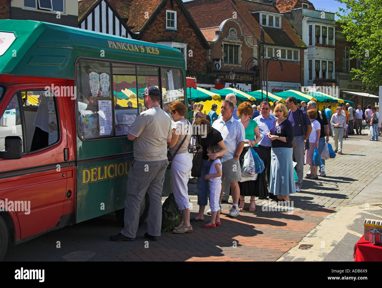 Long queue at an ice cream van in Salisbury market in June Wiltshire ...