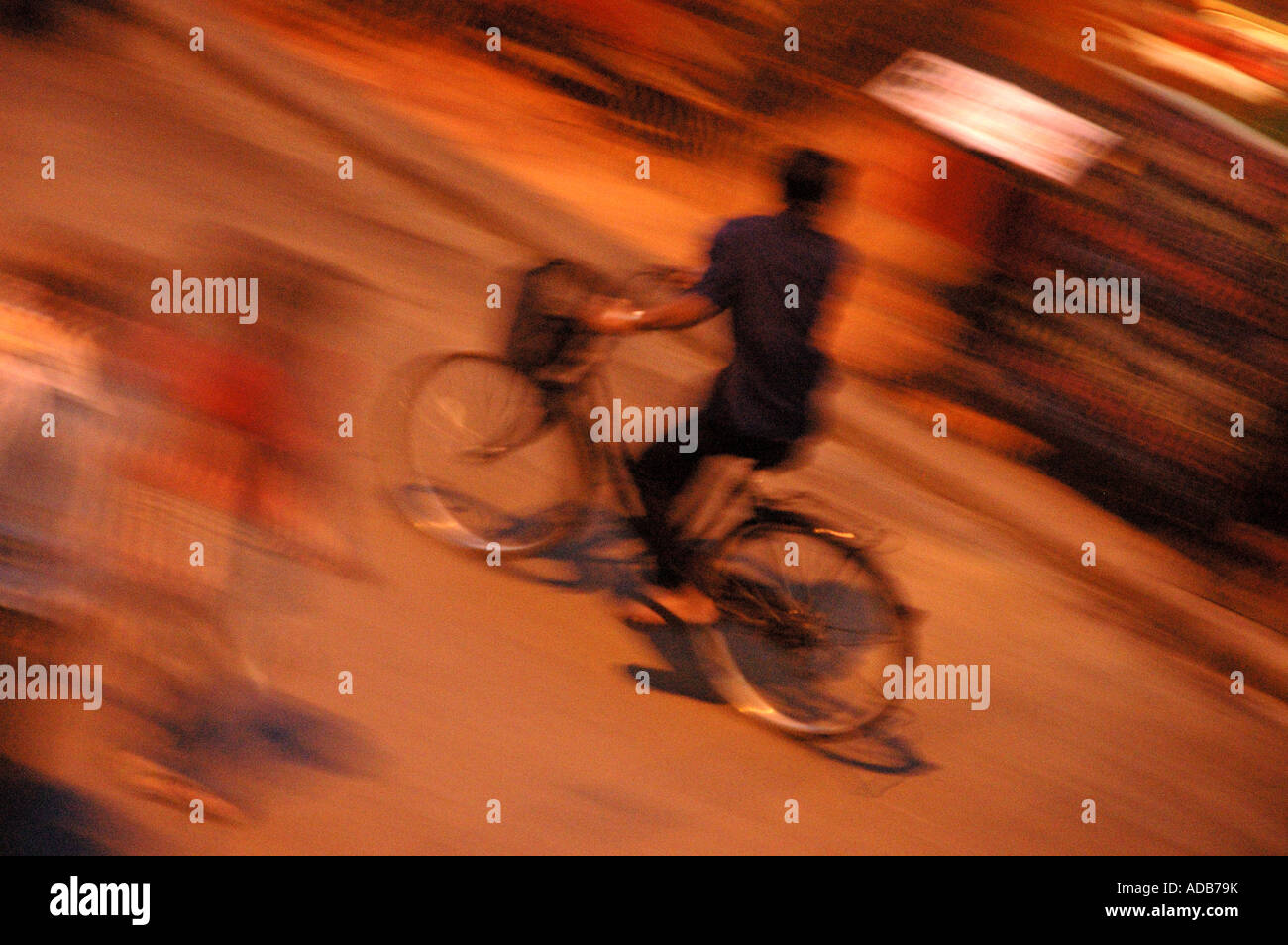 fast moving bicycle at night in camodia Stock Photo - Alamy