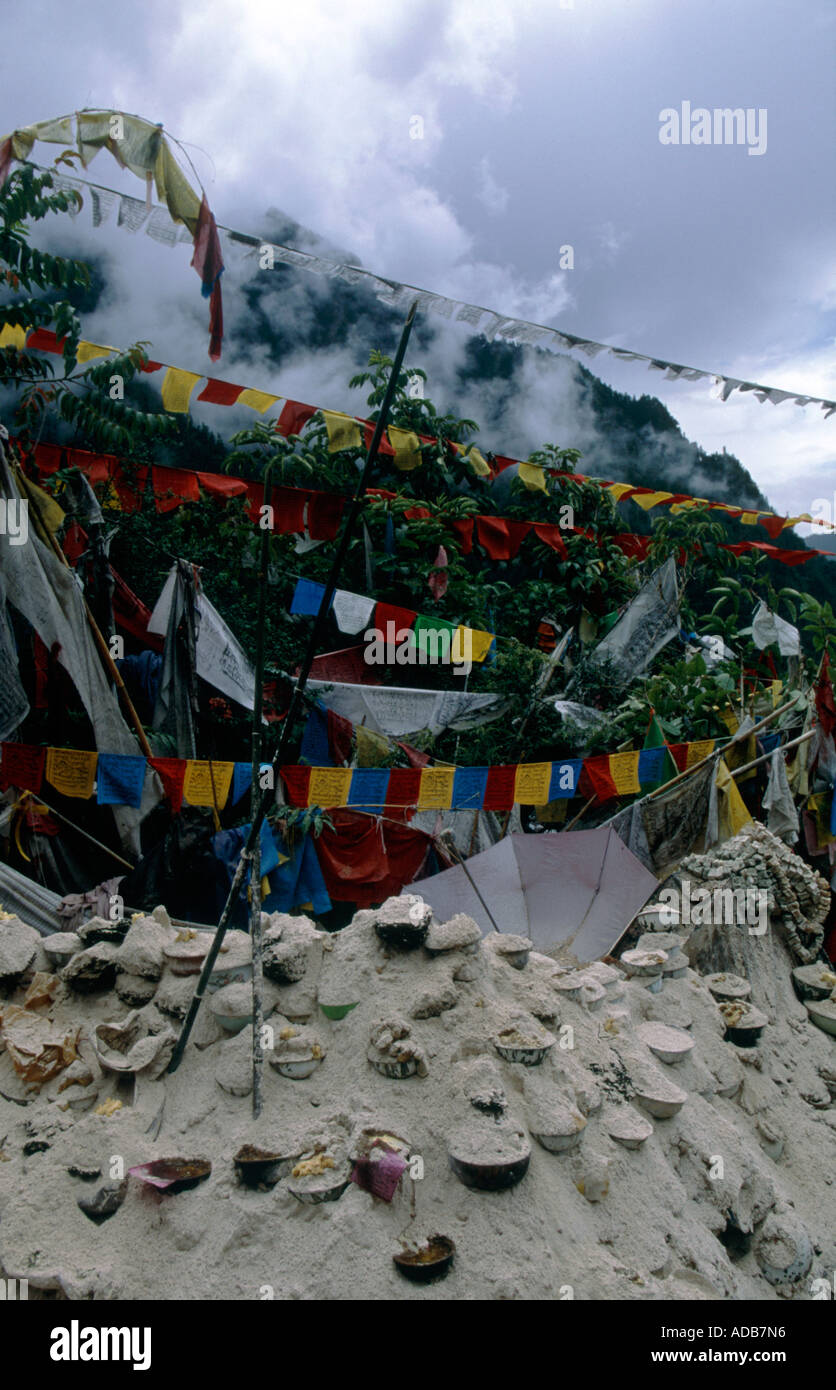 Offerings at a Shrine on Mountain path, East Tibet, China Stock Photo ...