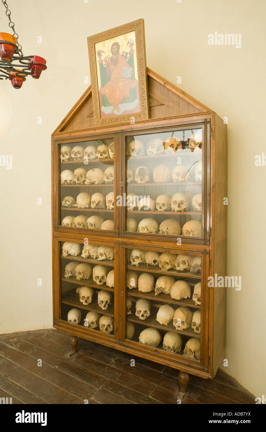 Skeletonized skulls in a showcase in the ossuary of the Arkadi ...