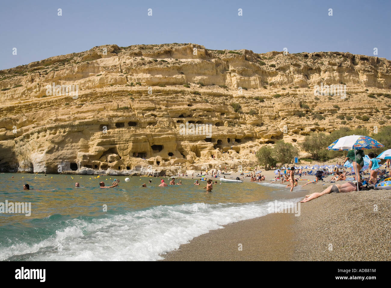 Tourists enjoying their vacation at Matala beach / Crete / Greece Stock ...