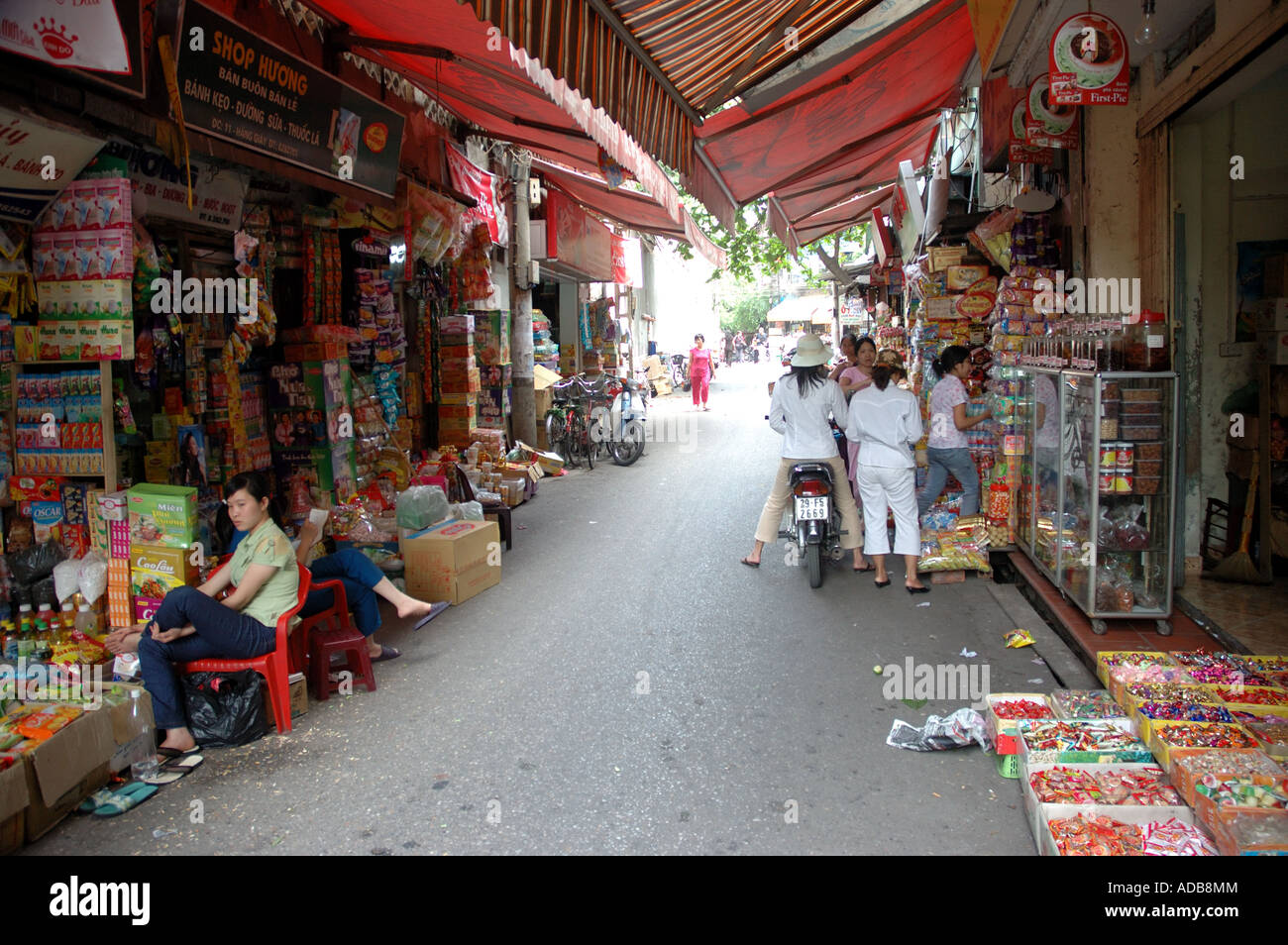 Full shop fronts on a street in hanoi in Vietnam Stock Photo - Alamy