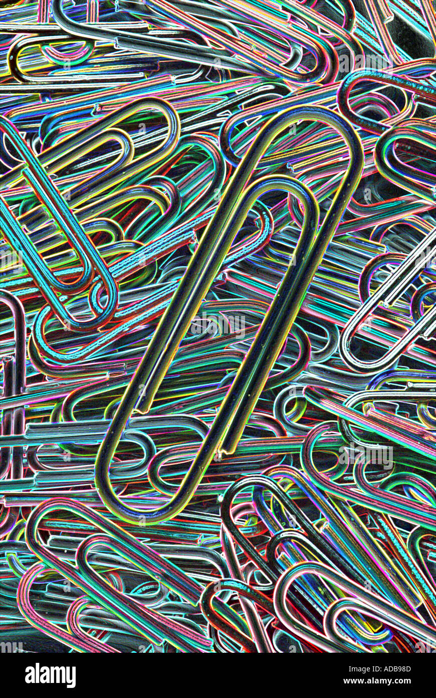 A solarised image of multi coloured paper clips Stock Photo - Alamy