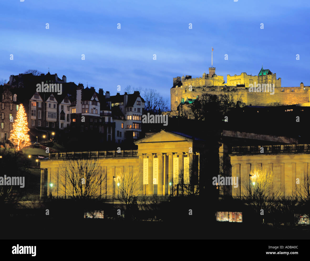 Part of The Royal Mile, Edinburgh Castle and National Galley at night ...