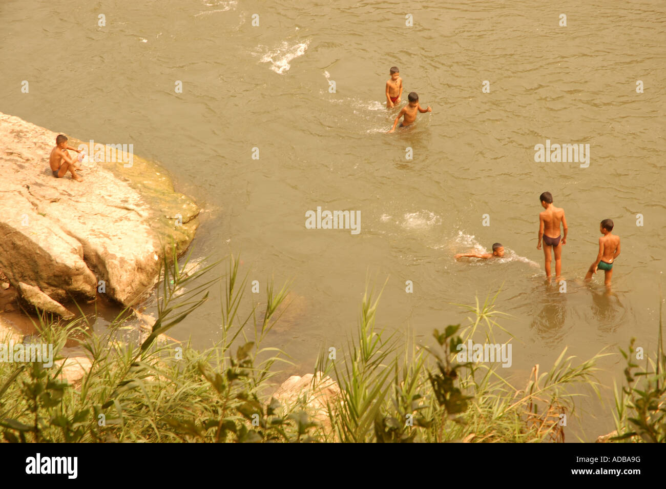 Children playing in the mekong river in laos Stock Photo - Alamy