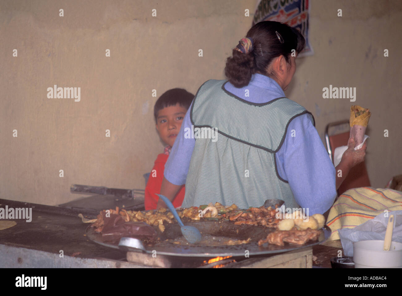 Mother and child making Tortillas central Mexico Stock Photo - Alamy