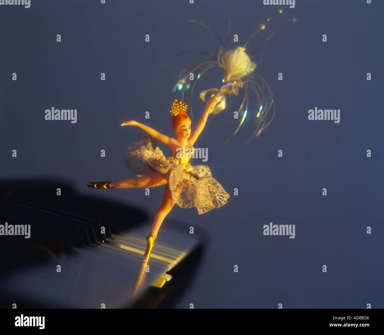 Ballerina dances on piano Stock Photo - Alamy