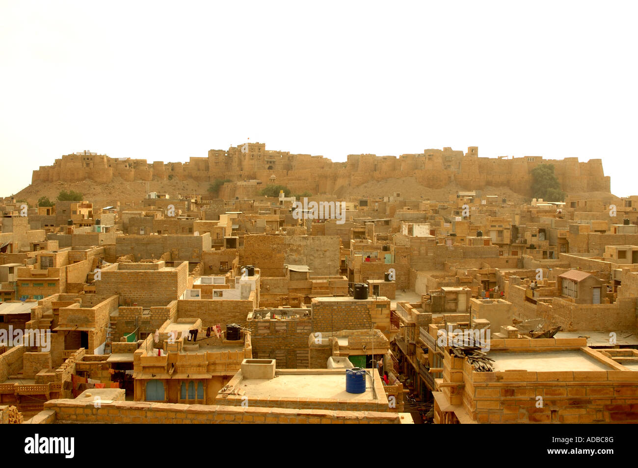 A view of the ancient Rajasthan City of Jaisalmer in India with palace ...
