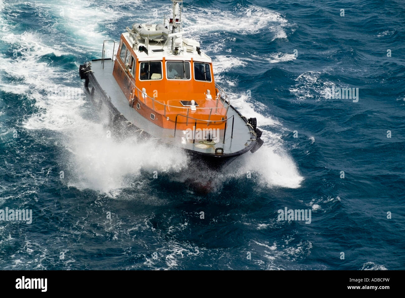 Orange Rescue Boat Stock Photo - Alamy