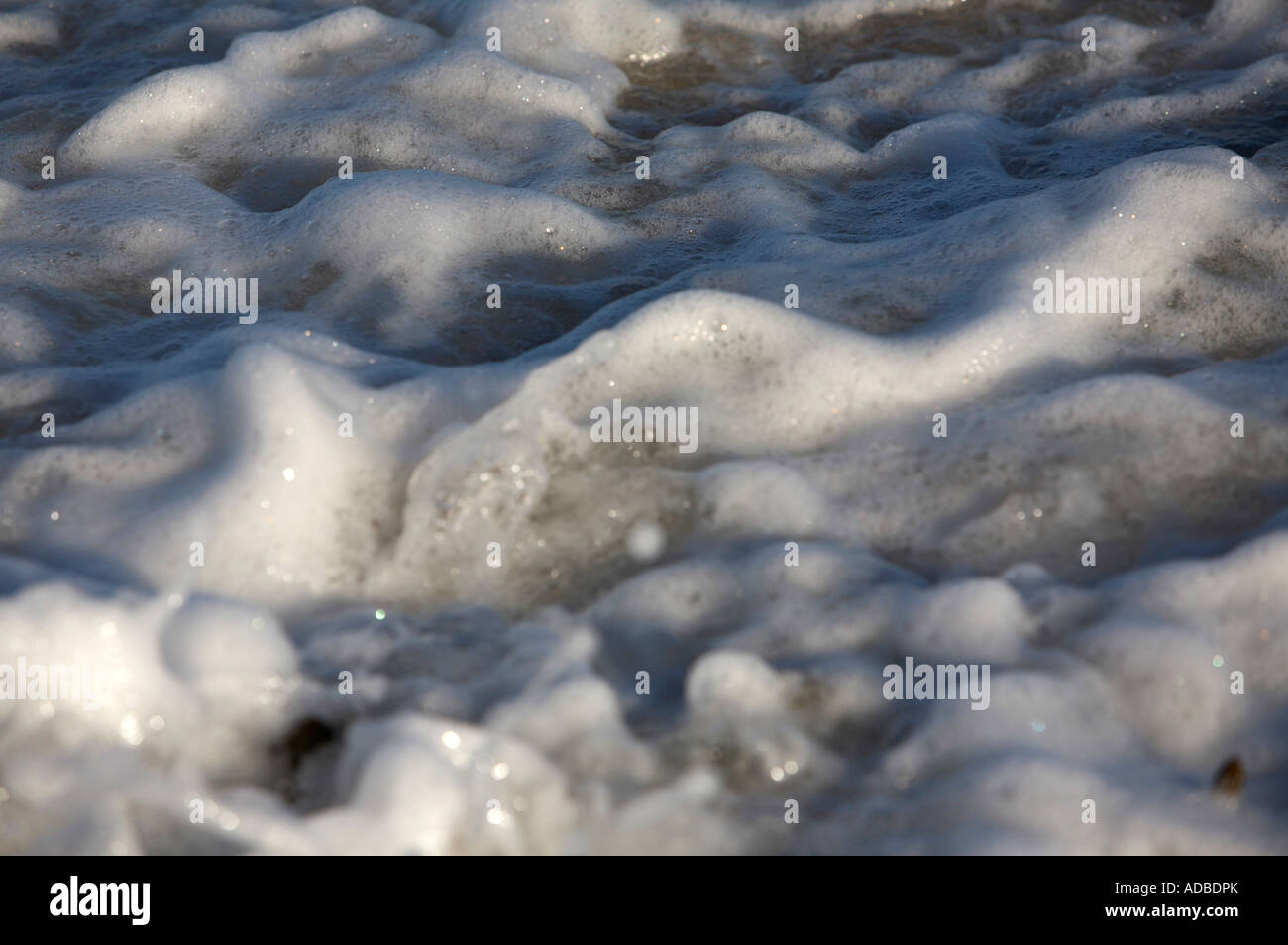 Waves on beach rushing up hi-res stock photography and images - Alamy
