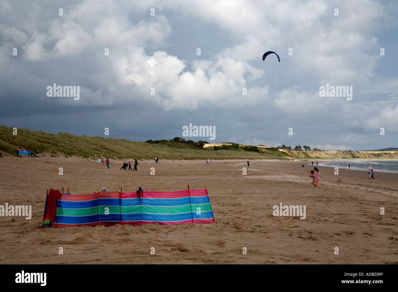 holidaymakers on Curracloe beach county wexford as storm clouds ...
