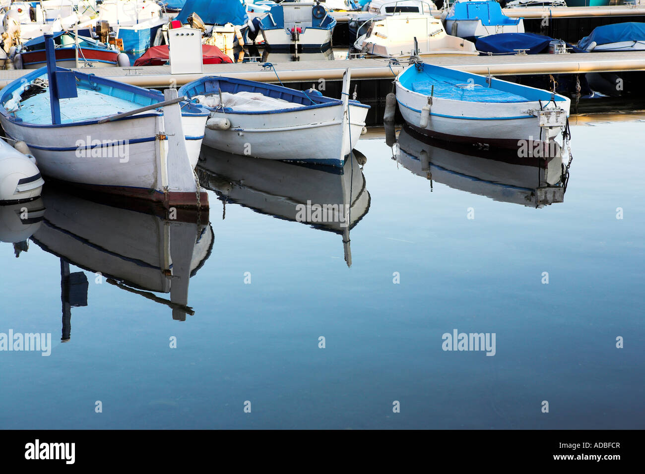 A few fishing boats floating in Antibes France Stock Photo - Alamy