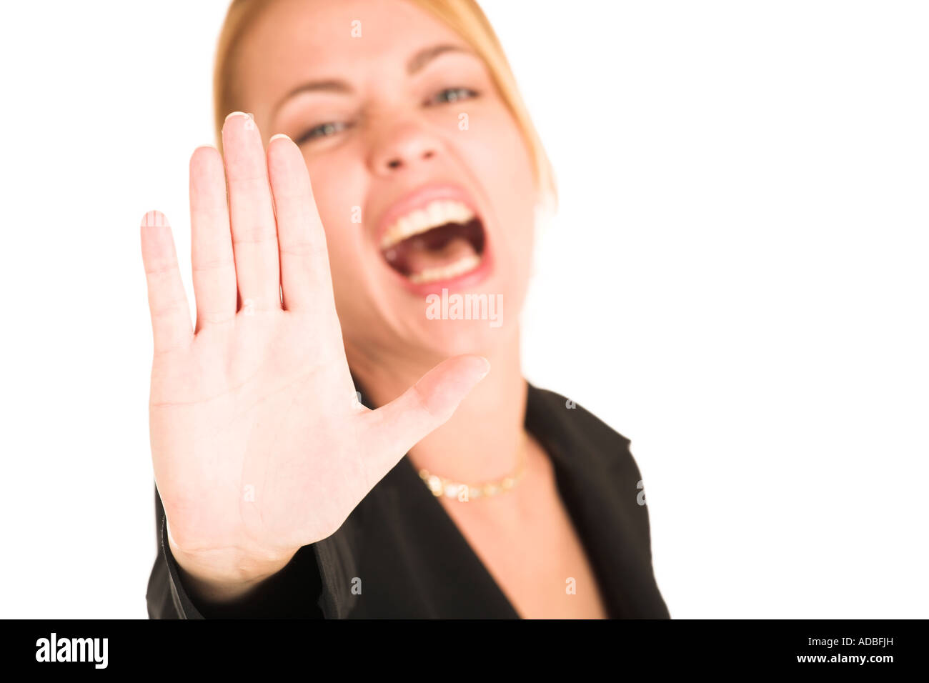 Blonde business lady in formal black suit Showing stop sign Stock Photo ...