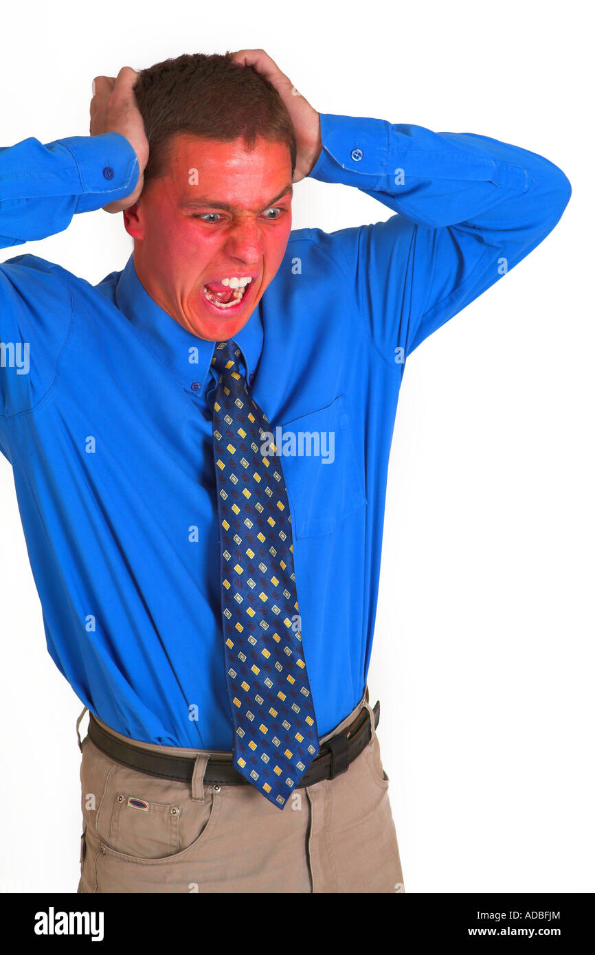 Red faced businessman screaming Stock Photo - Alamy