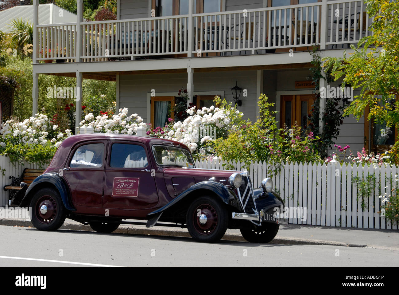 Vintage car outside weatherboard house Akaroa Banks Peninsular South ...