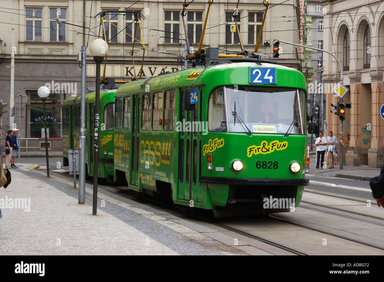 Colorful green tram boosting advertisements Stock Photo - Alamy