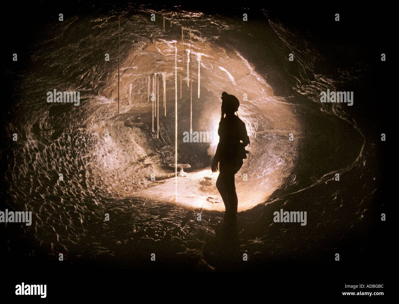 Female caver with straw column in Dan yr Ogof cave Wales UK Stock Photo ...