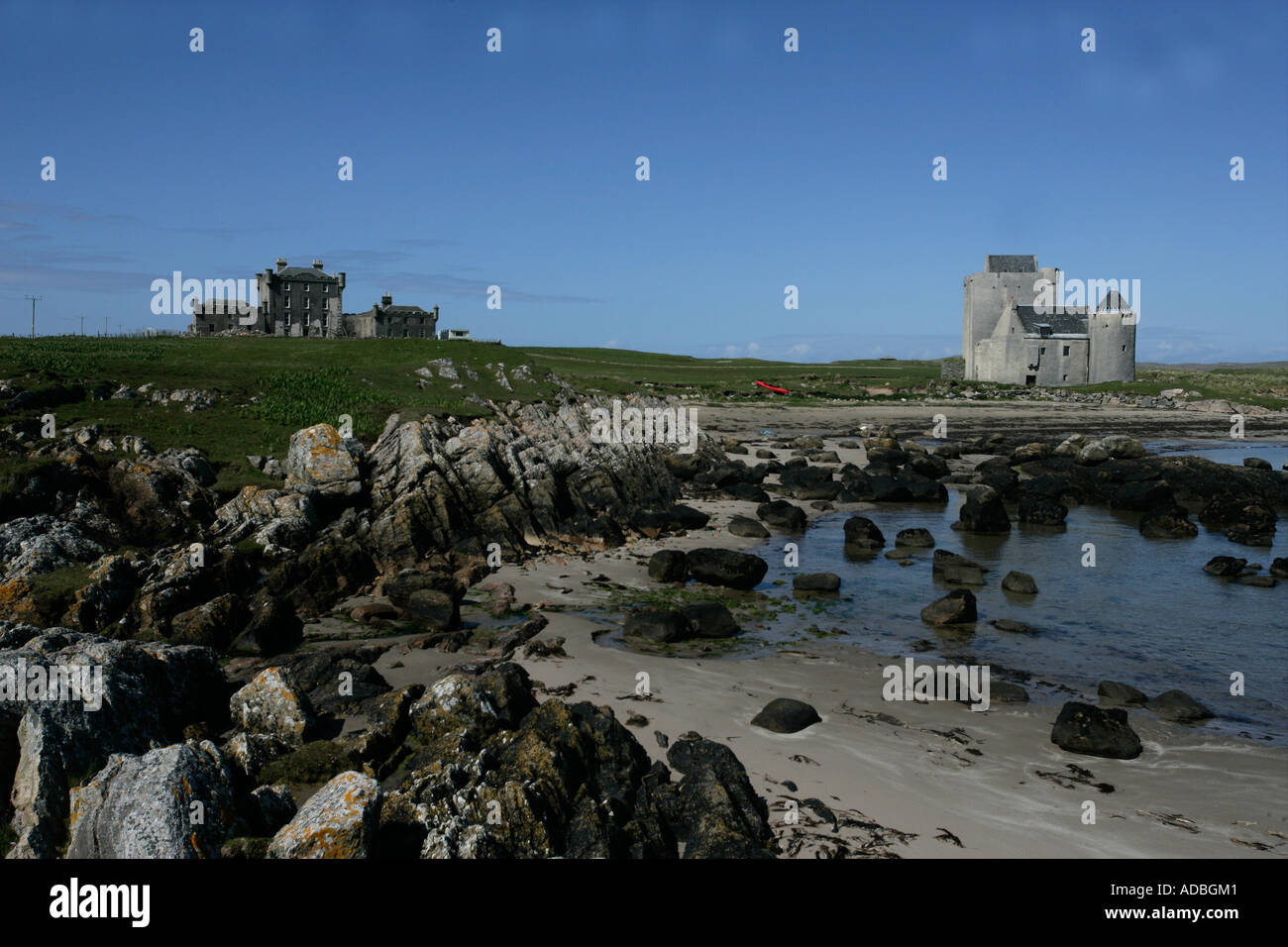 The old and new Breachacha Castles at Loch Breachacha Stock Photo - Alamy