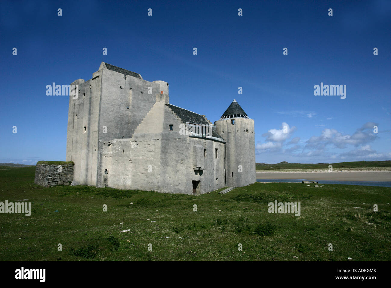 The old Breachacha Castle at Loch Breachacha Stock Photo - Alamy