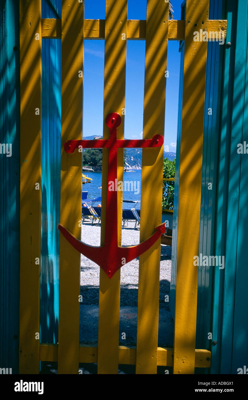 Brightly painted gate to beach in summer Rapallo Italian Riviera Italy ...