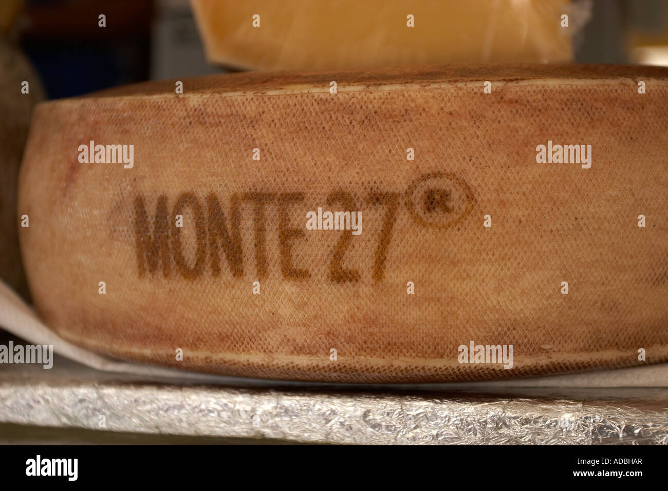 Monte 27 cheese on a market stall Stock Photo - Alamy