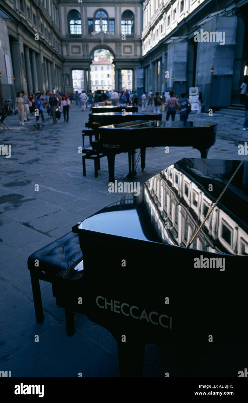 Reflection in grand piano's at classical musical festival The Uffizi ...