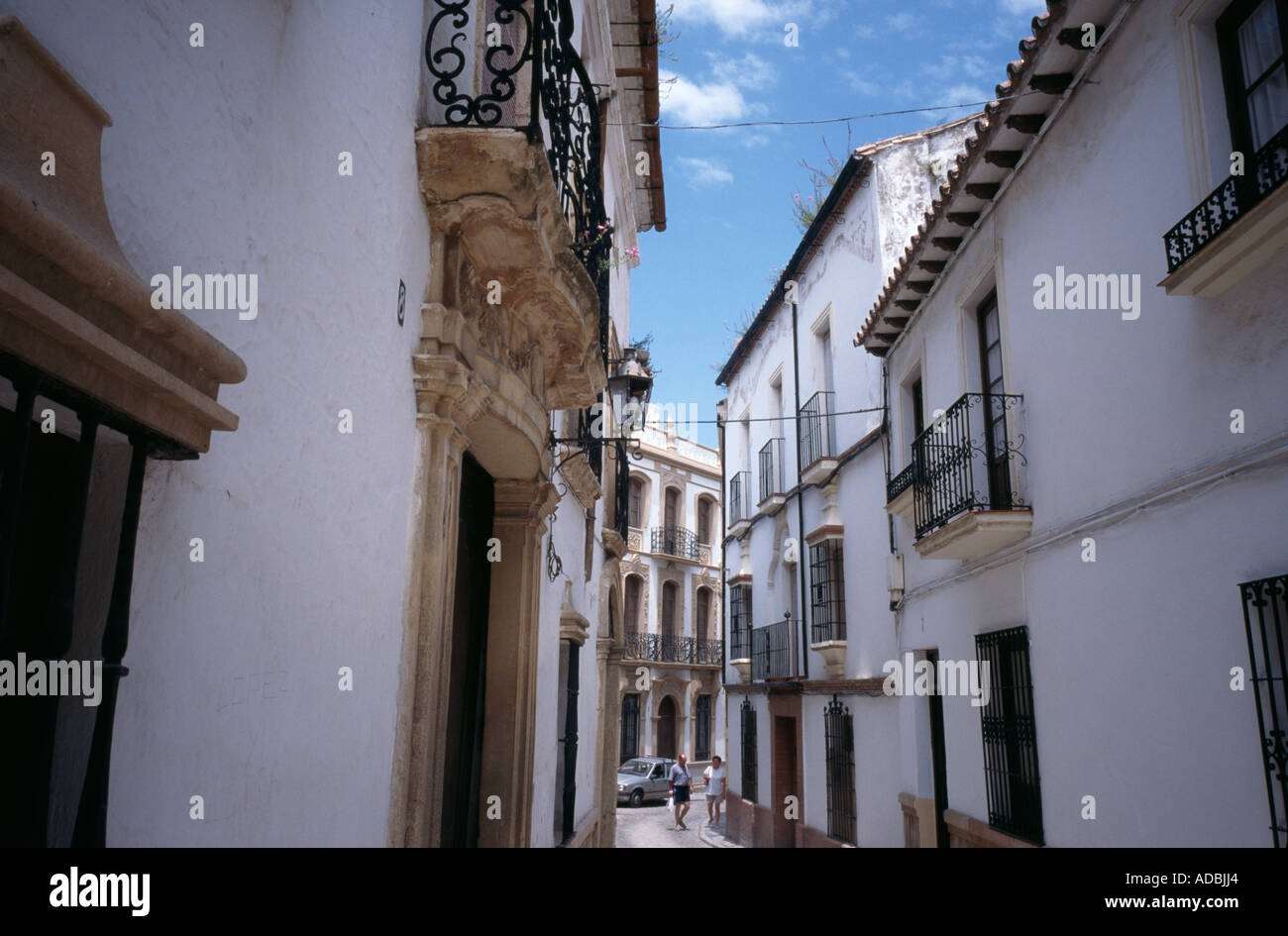 Whitewashed houses in the narrow streets of Andalucian hilltop town of ...