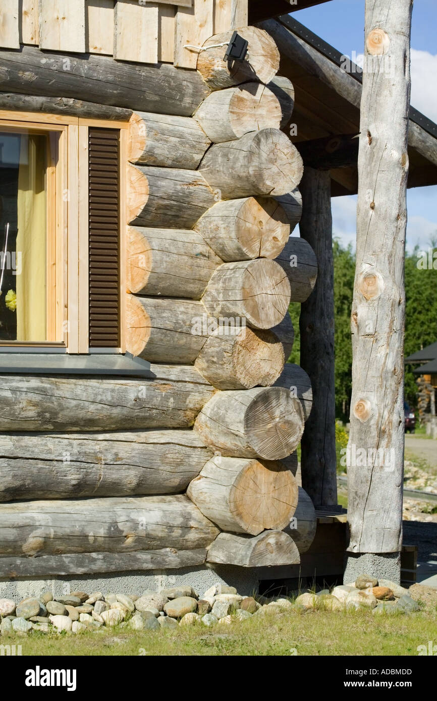 grey logs in log cabin wall corner Stock Photo - Alamy