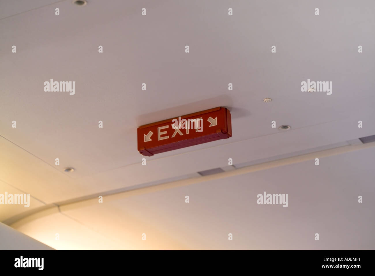exit sign on airplane interior Stock Photo - Alamy