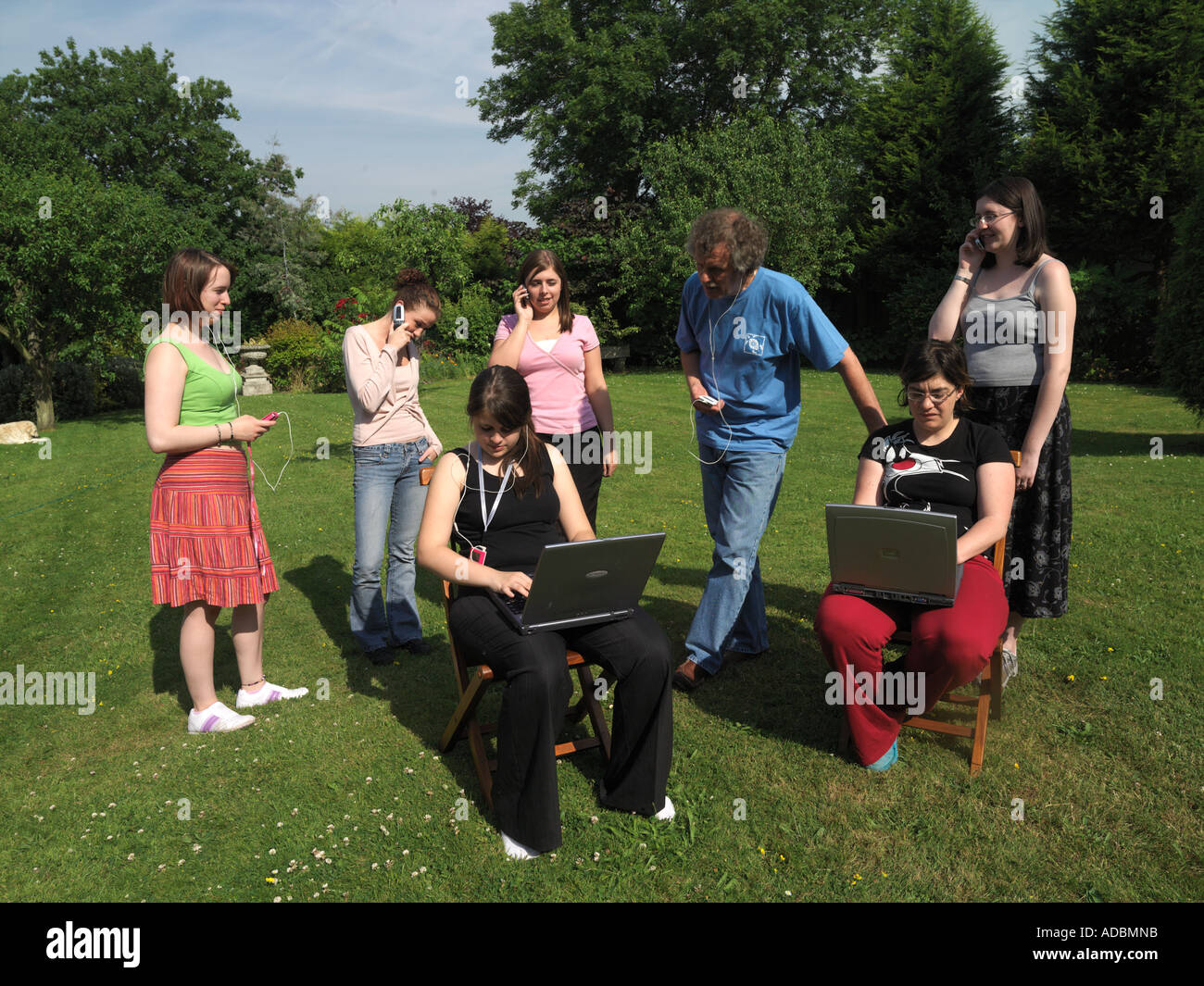 Technology Group of People Using Laptops Ipods and Mobile Phones Stock ...