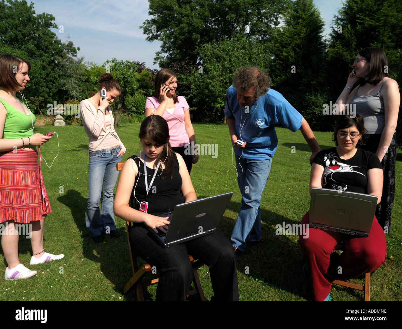Technology Group of People Using Laptops Ipods and Mobile Phones Stock ...