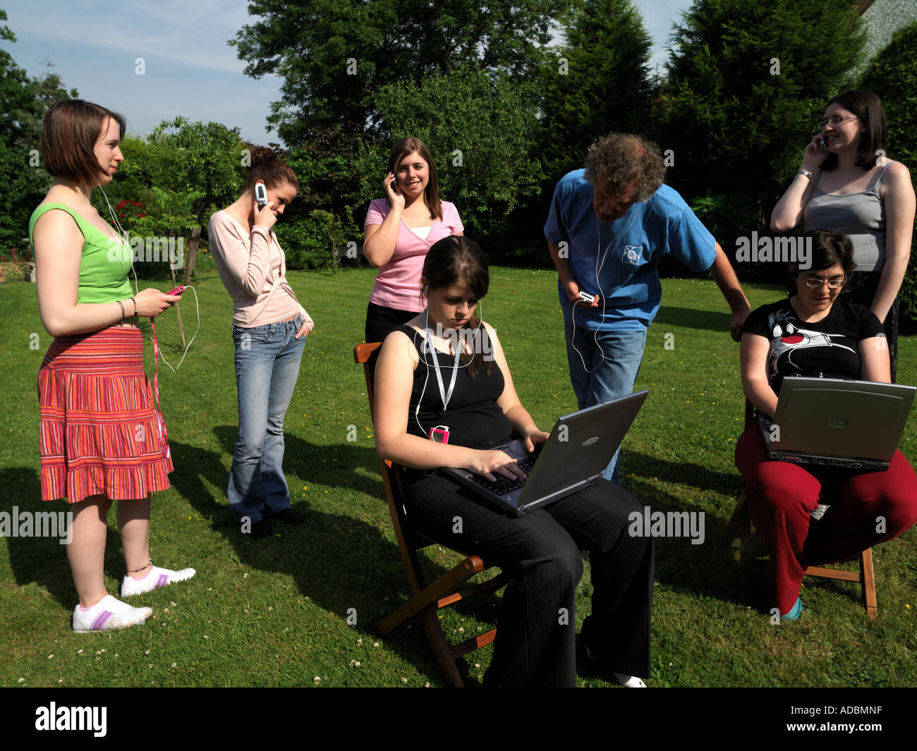 Technology Group of People Using Laptops Ipods and Mobile Phones Stock ...