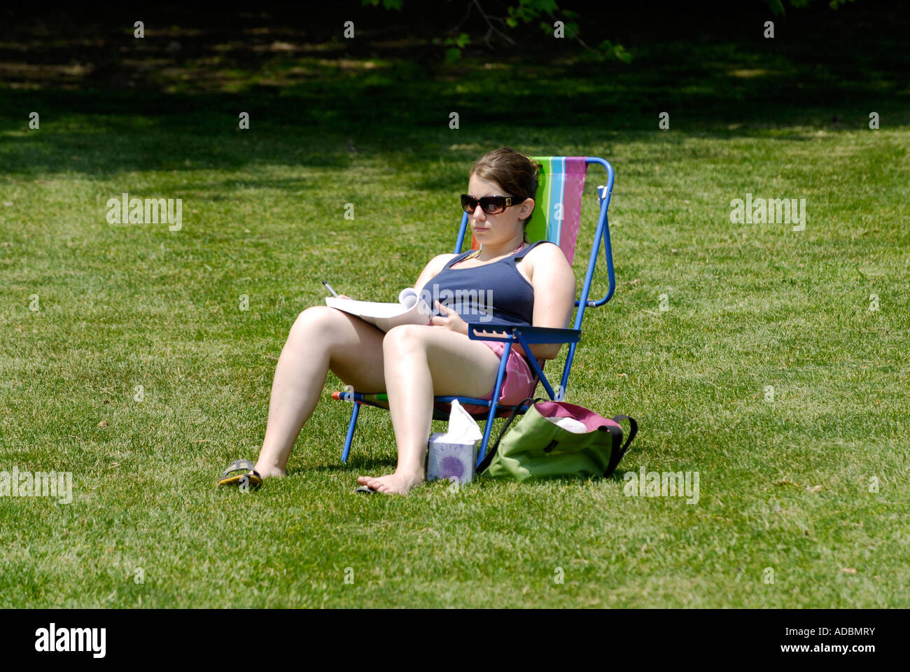 Student reads book on The campus of Penn Pennsylvania State University ...