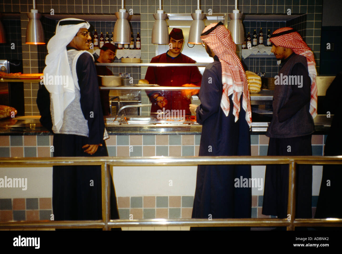 Kuwait Self Service Restaurant Arabs At Counter Stock Photo - Alamy