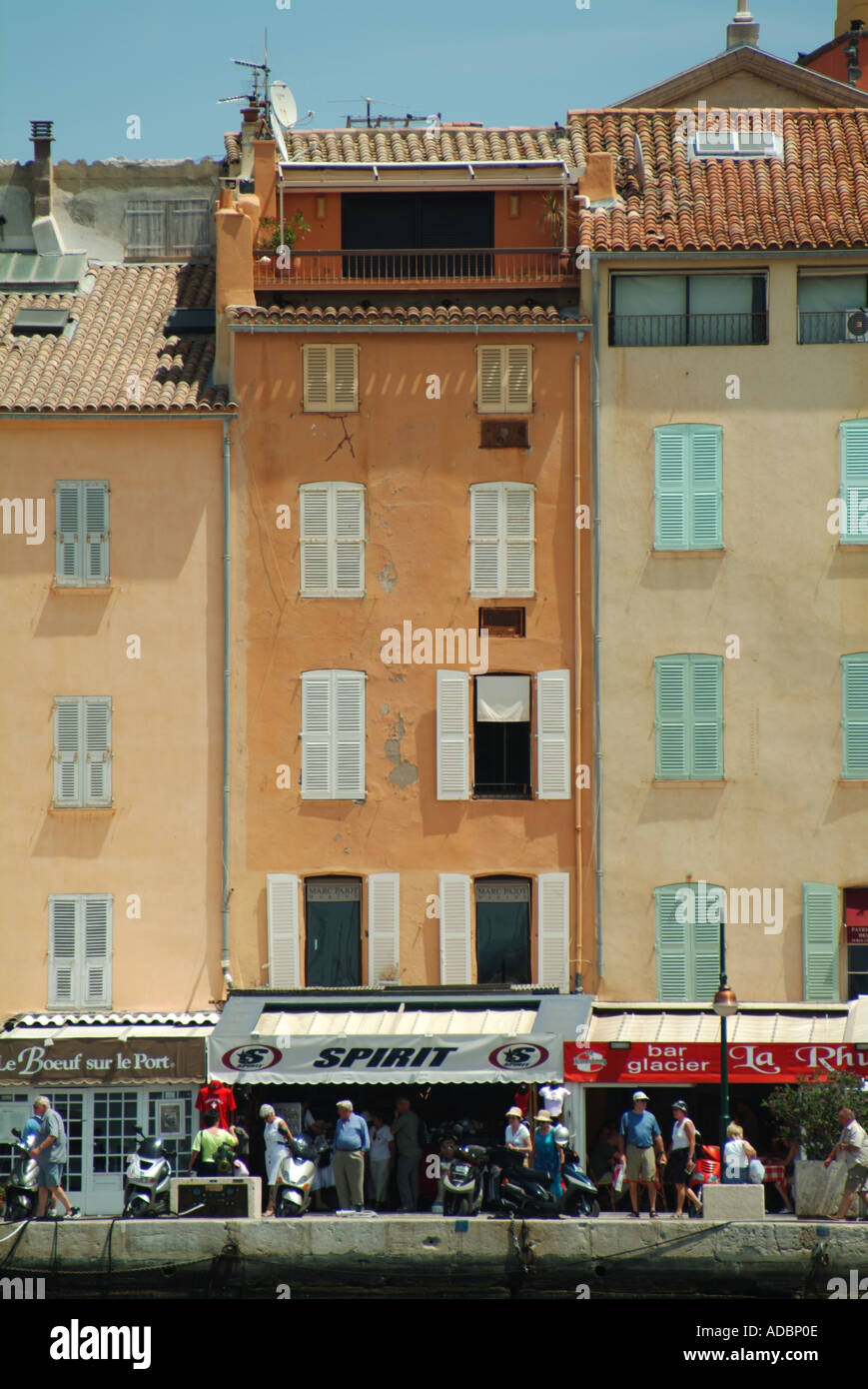 St Tropez waterfront ground floor pavement bars and shops with ...