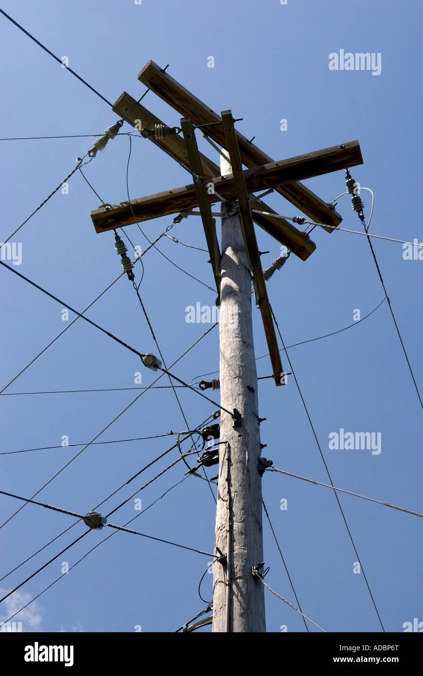 Electrical power poll with many connecting wires Stock Photo - Alamy