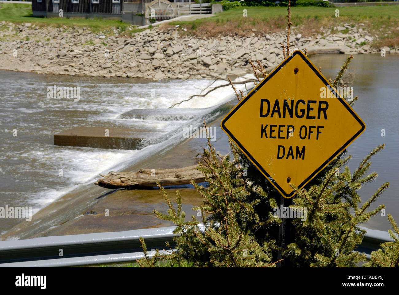 Warning danger to keep of dam sign Stock Photo - Alamy