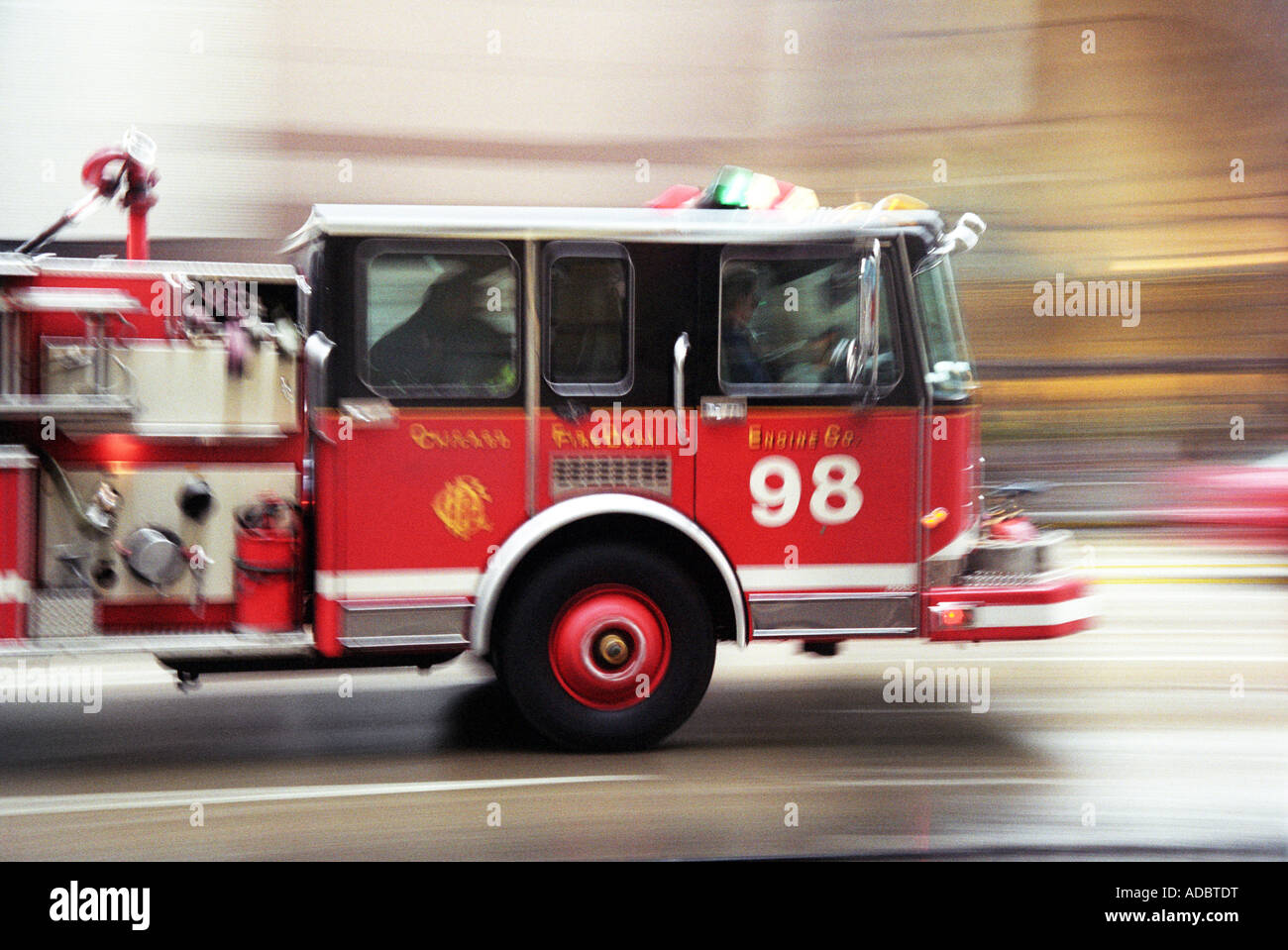 A firetruck races to a fire in Chicago, Illinois, USA Stock Photo - Alamy