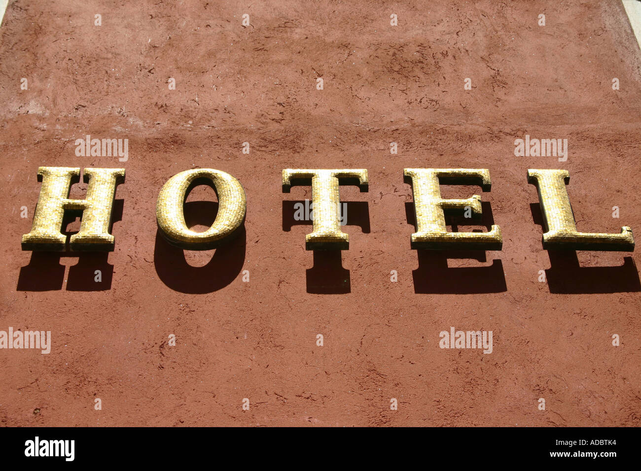 The word Hotel on a wall Stock Photo - Alamy
