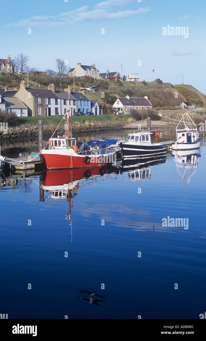Boats in the harbour of fishing village Helmsdale, Scotland Stock Photo ...