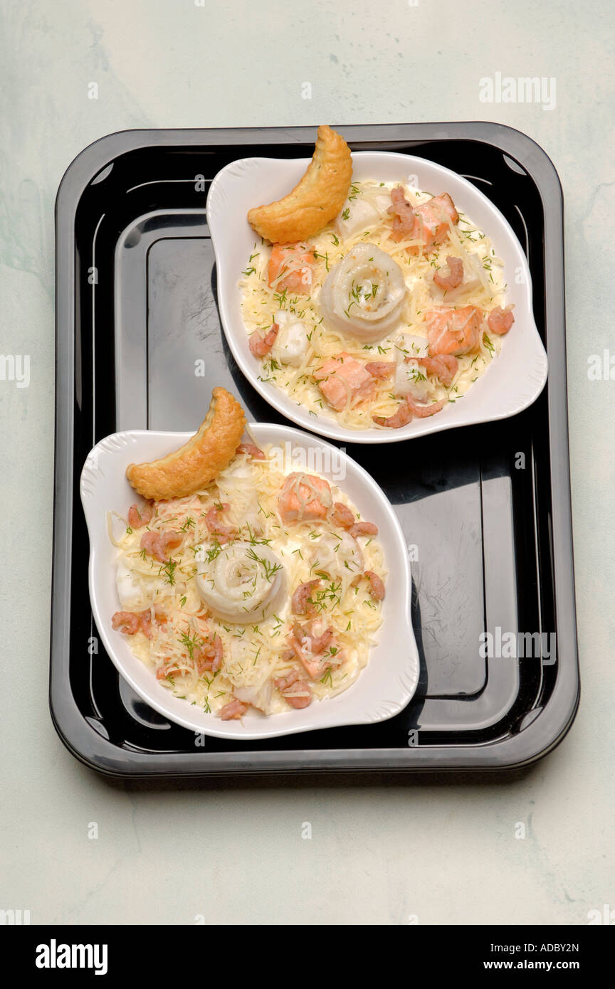 Mixed fish and seafood on spaghetti Stock Photo - Alamy