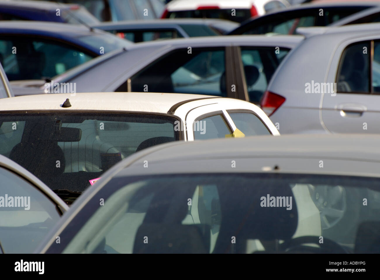 cars packed in a parking lot Stock Photo - Alamy