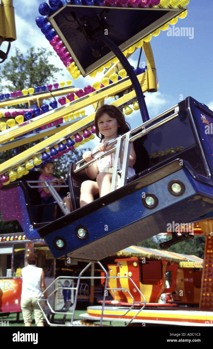 Child on fairground ride Stock Photo - Alamy