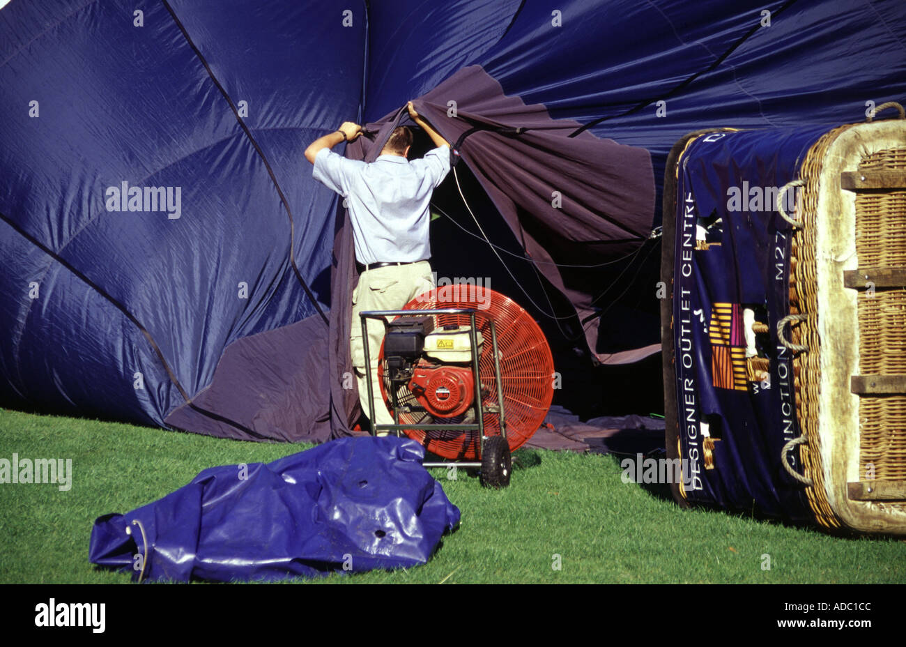 Hot air balloon inflation Stock Photo - Alamy