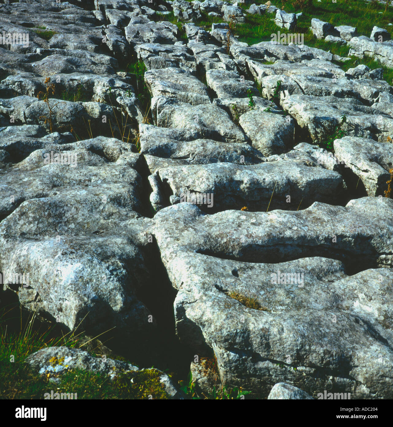 Limestone pavement above Malham Cove Yorkshire dales national park ...