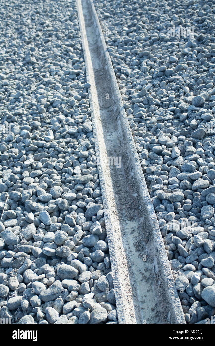 Gravel and concrete drain Stock Photo - Alamy