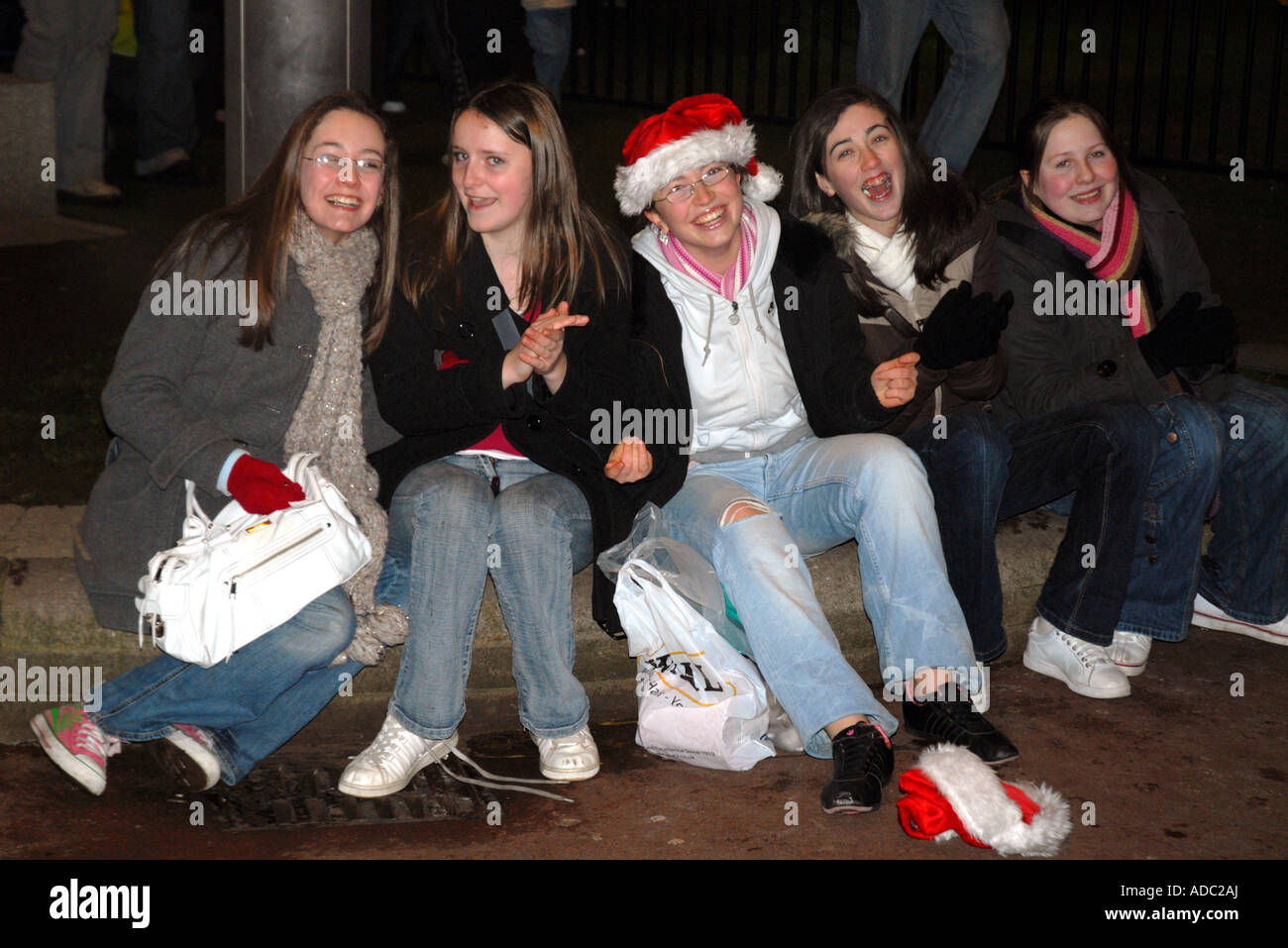 Young Teenage Girls Enjoying Festivities In George Square Christmas young-teenage-girls-enjoying-festivities-in-george-square-christmas