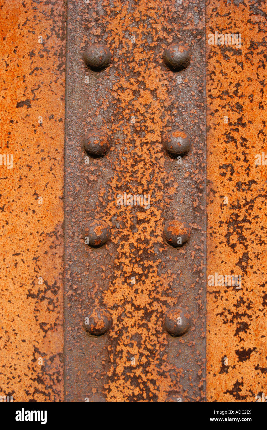 Rusty bolts heads on iron bridge Stock Photo - Alamy