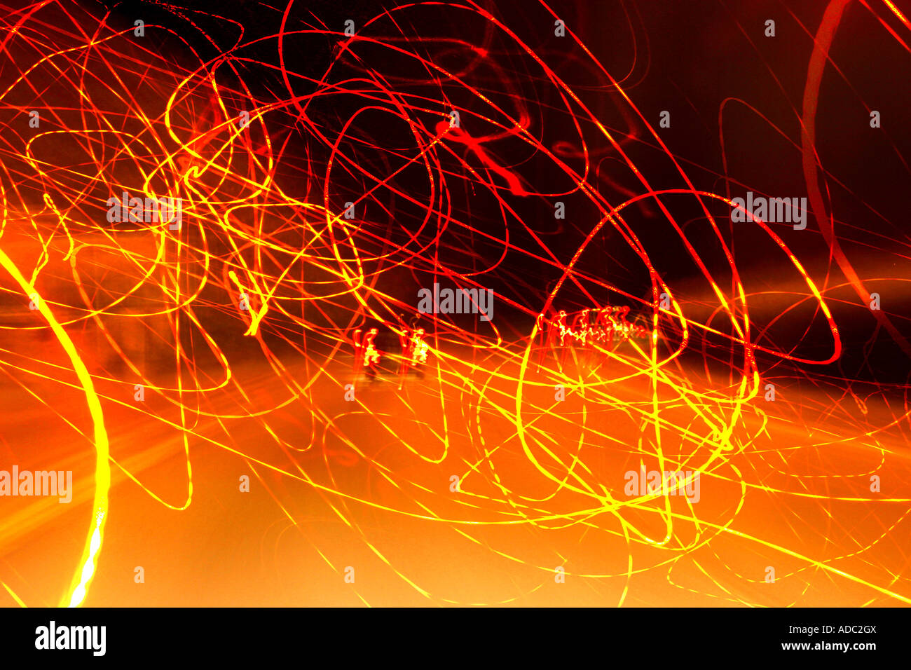 Soft focus abstract orange colours on a road at night Stock Photo - Alamy