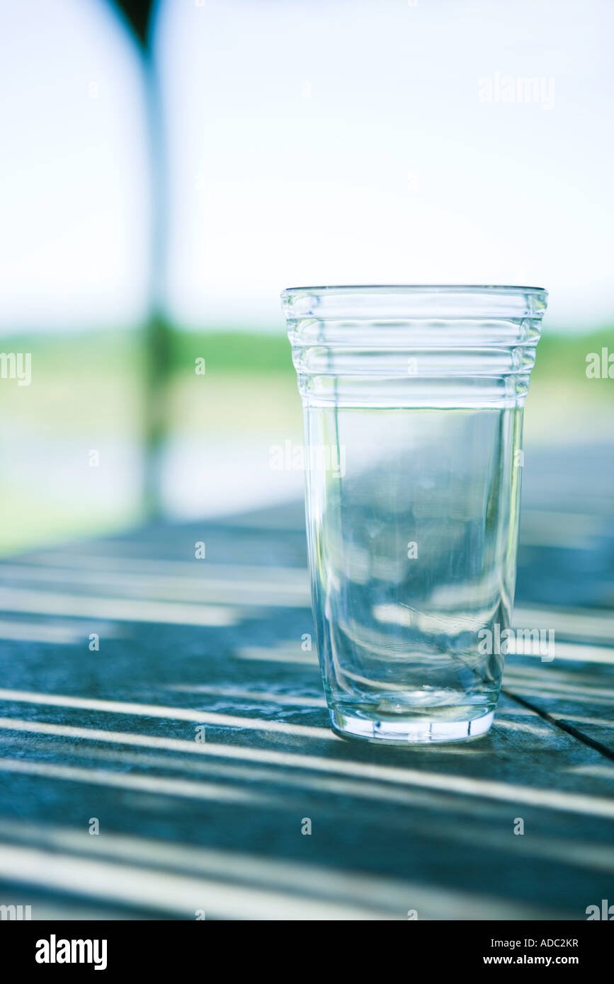 Glass on table Stock Photo - Alamy